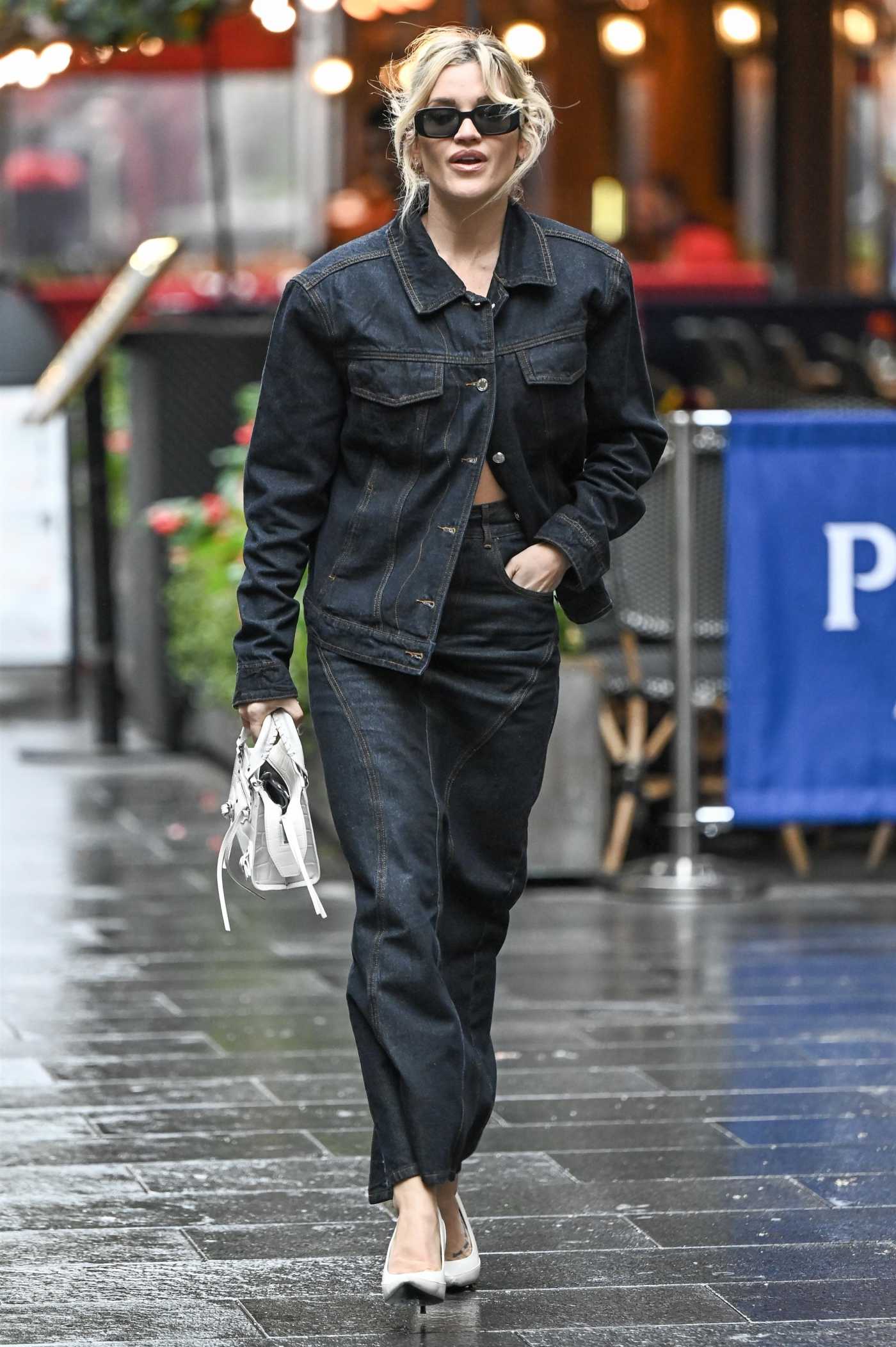 Ashley Roberts in a Black Striped Pantsuit Leaves the Heart Radio in ...